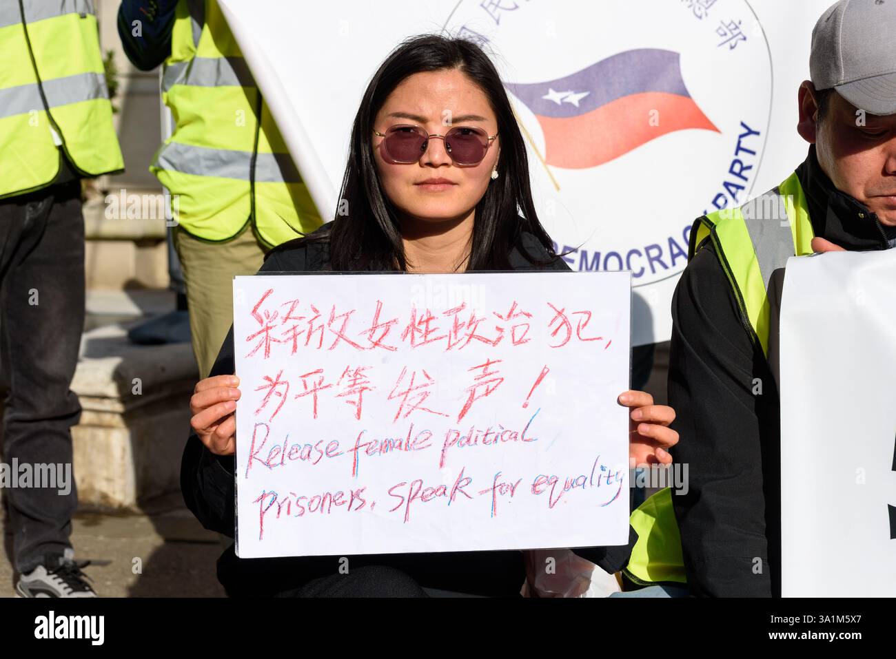 London, UK. 8 March 2025. Solidarity demonstrations outside the Chinese ...