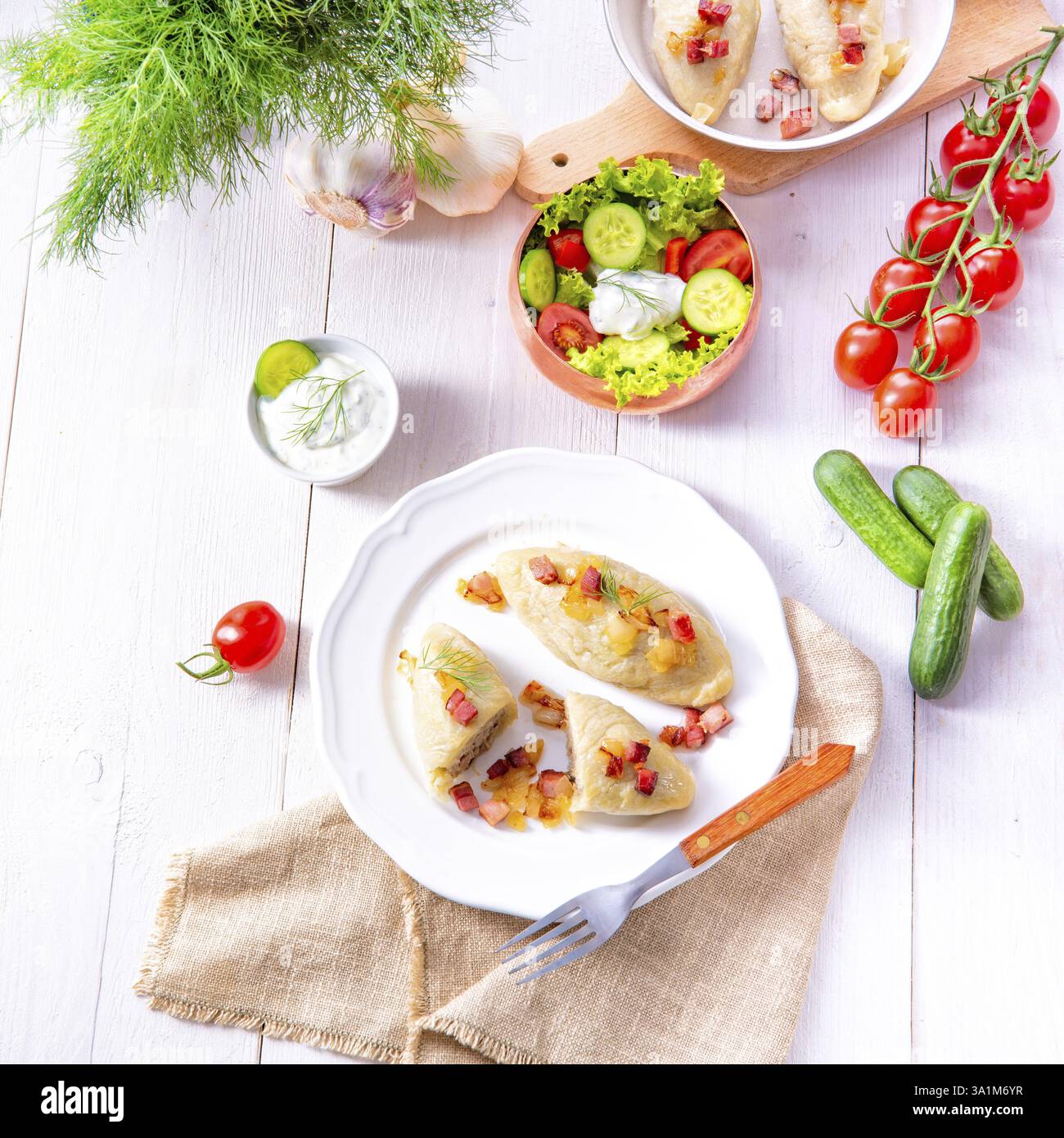 Rustic Cepelinai, a specialty Lithuanian and Polish cuisine Stock Photo ...