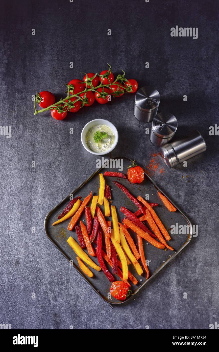 Colorful vegetable fries from the oven Stock Photo - Alamy