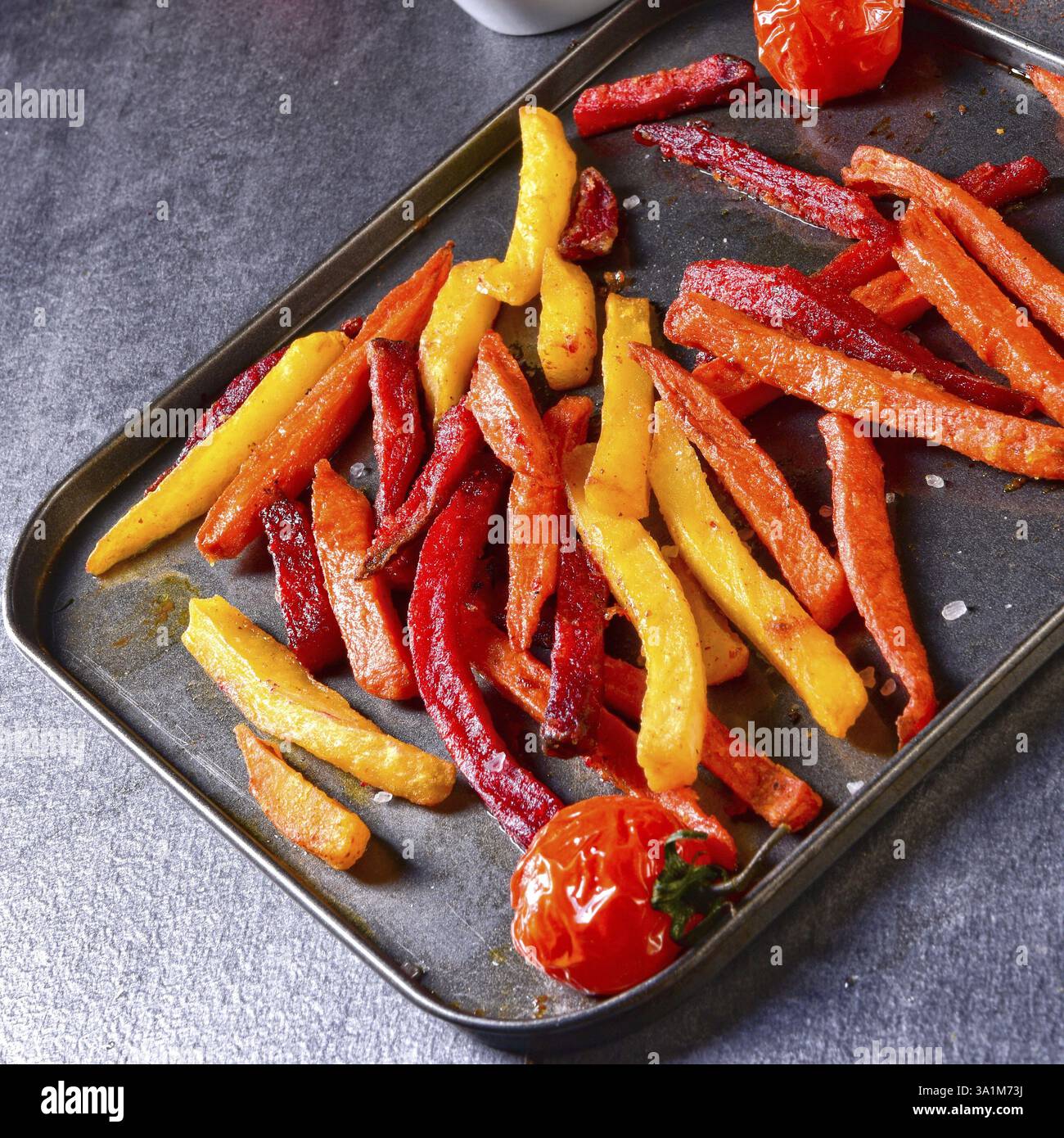 Colorful vegetable fries from the oven Stock Photo - Alamy