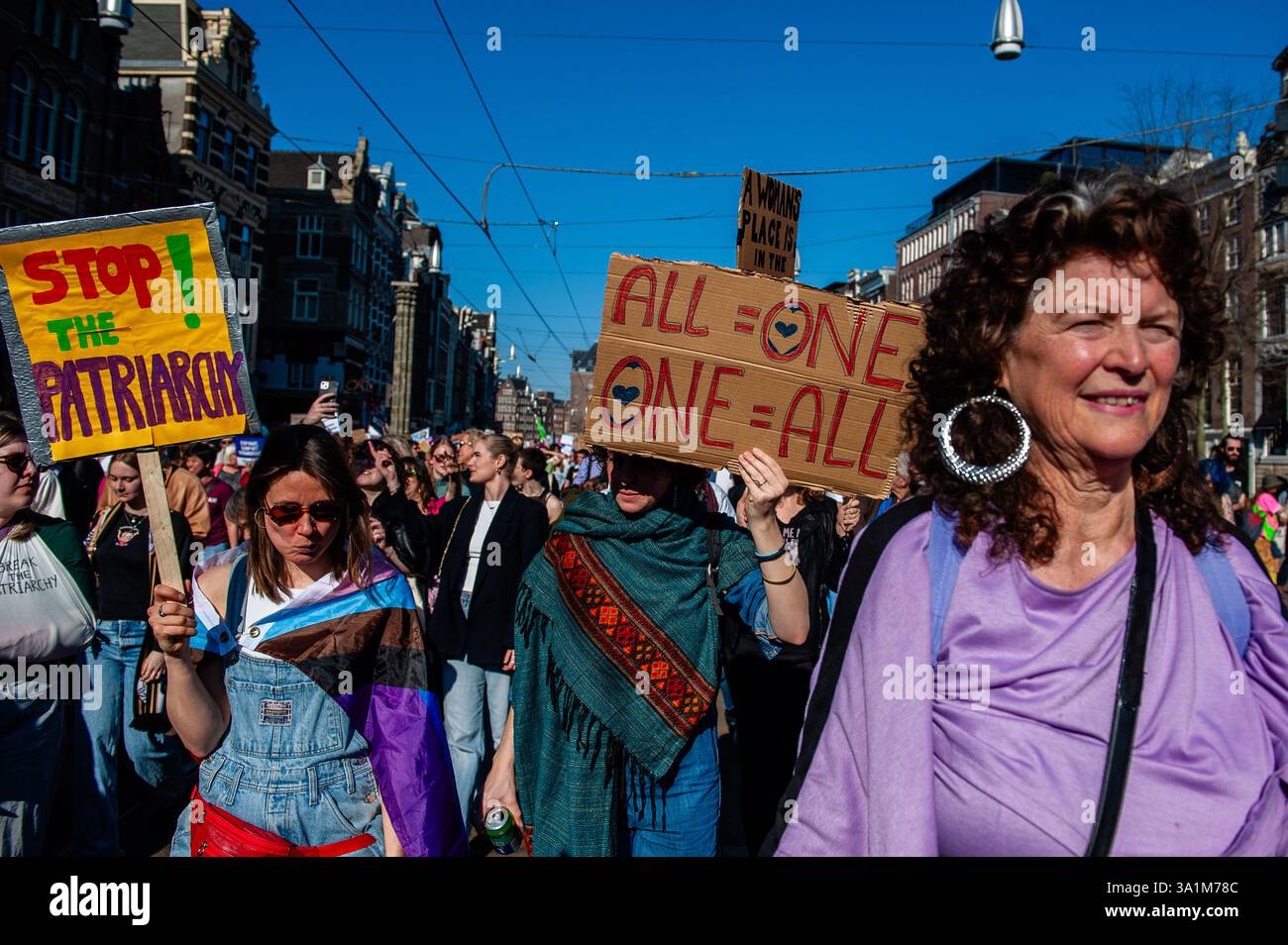 Amsterdam, Netherlands. 08th Mar, 2025. Women are seen marching with ...