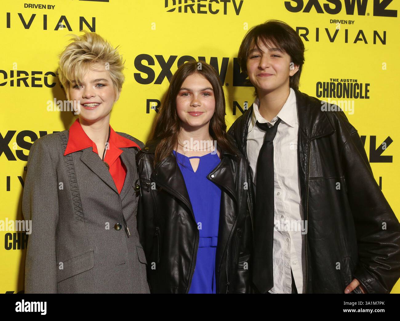 Presley Anderson, Avery Taylor and Vincent Juskalian, from left, arrive for the world premiere ...