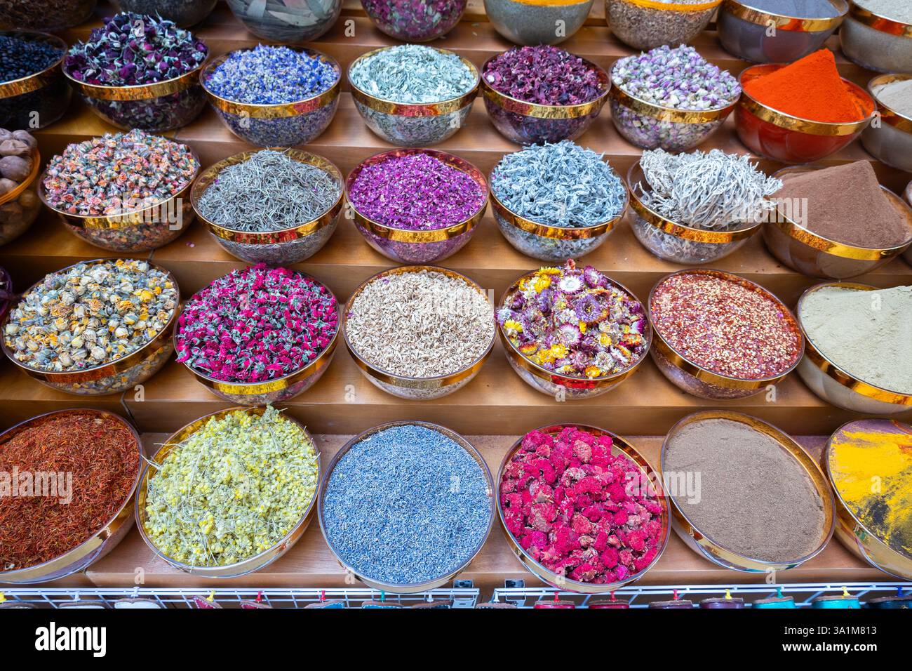 Traditional spices market. Pots and wooden tubs stand in row with ...