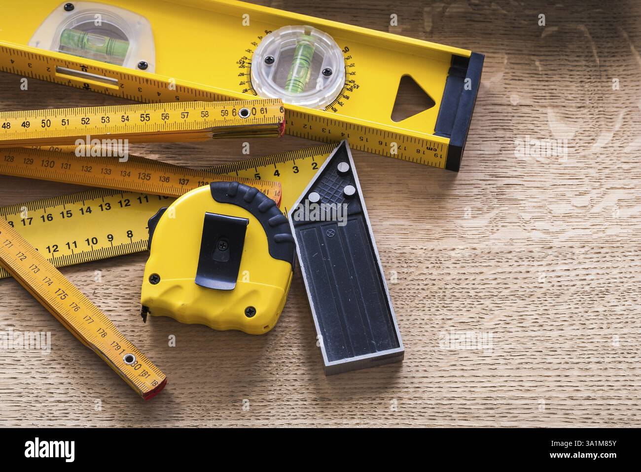 Oaken board with wooden meter measuring line construction level and ...