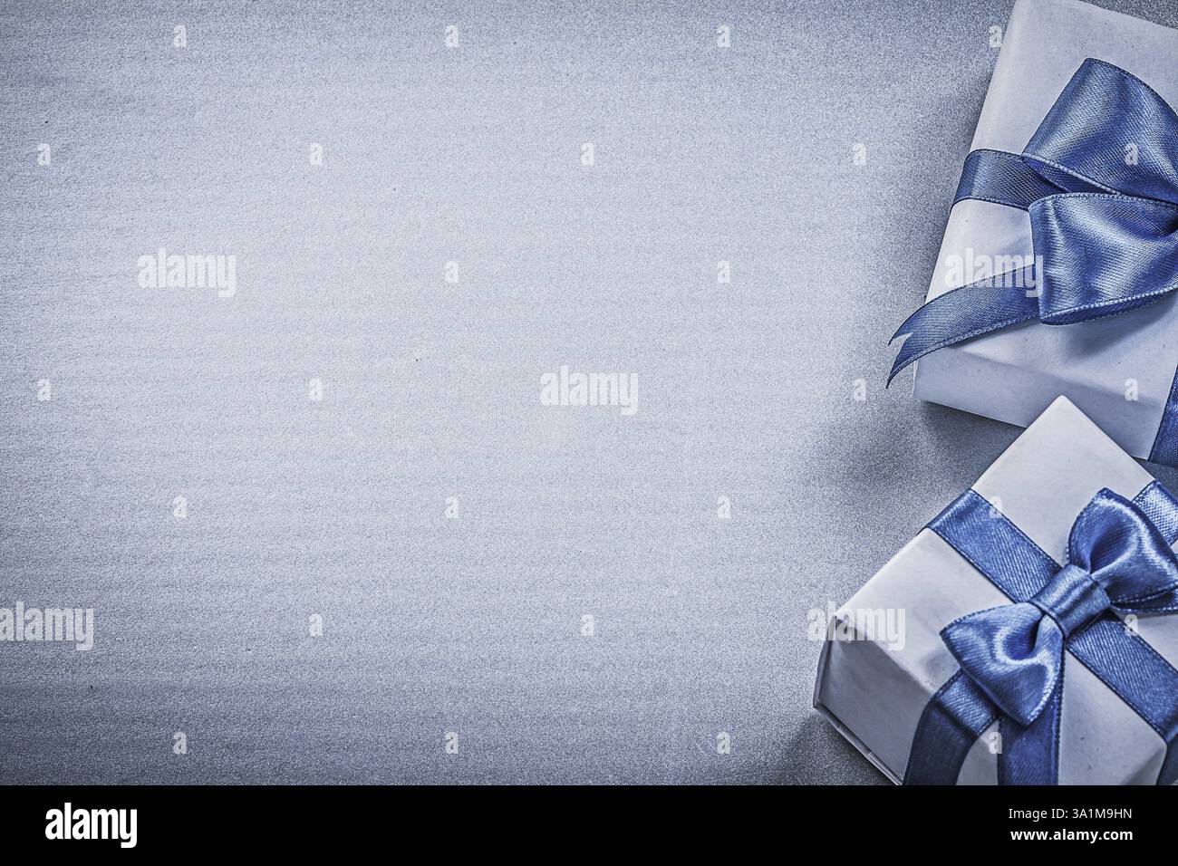 Present boxes on blue background greeting card copyspace holidays ...