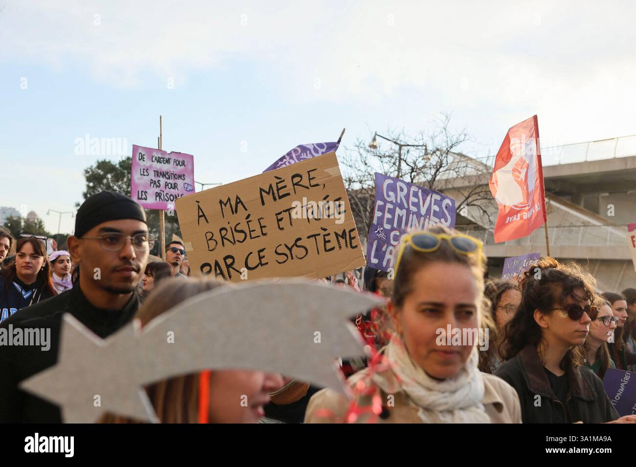 The signs held by the protesters display messages of support for the ...