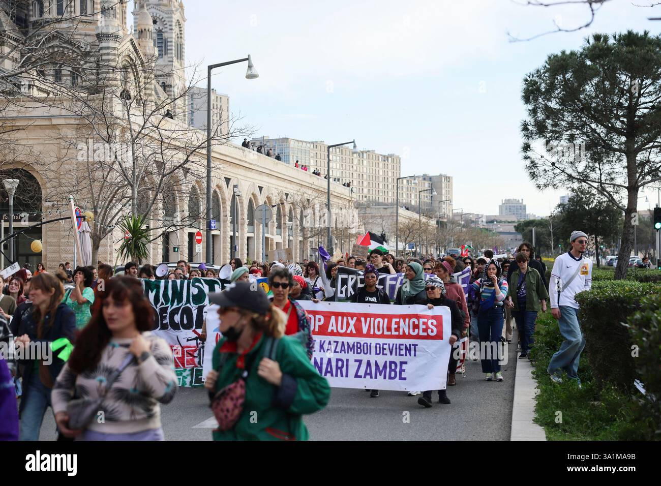 The signs held by the protesters display messages of support for the ...