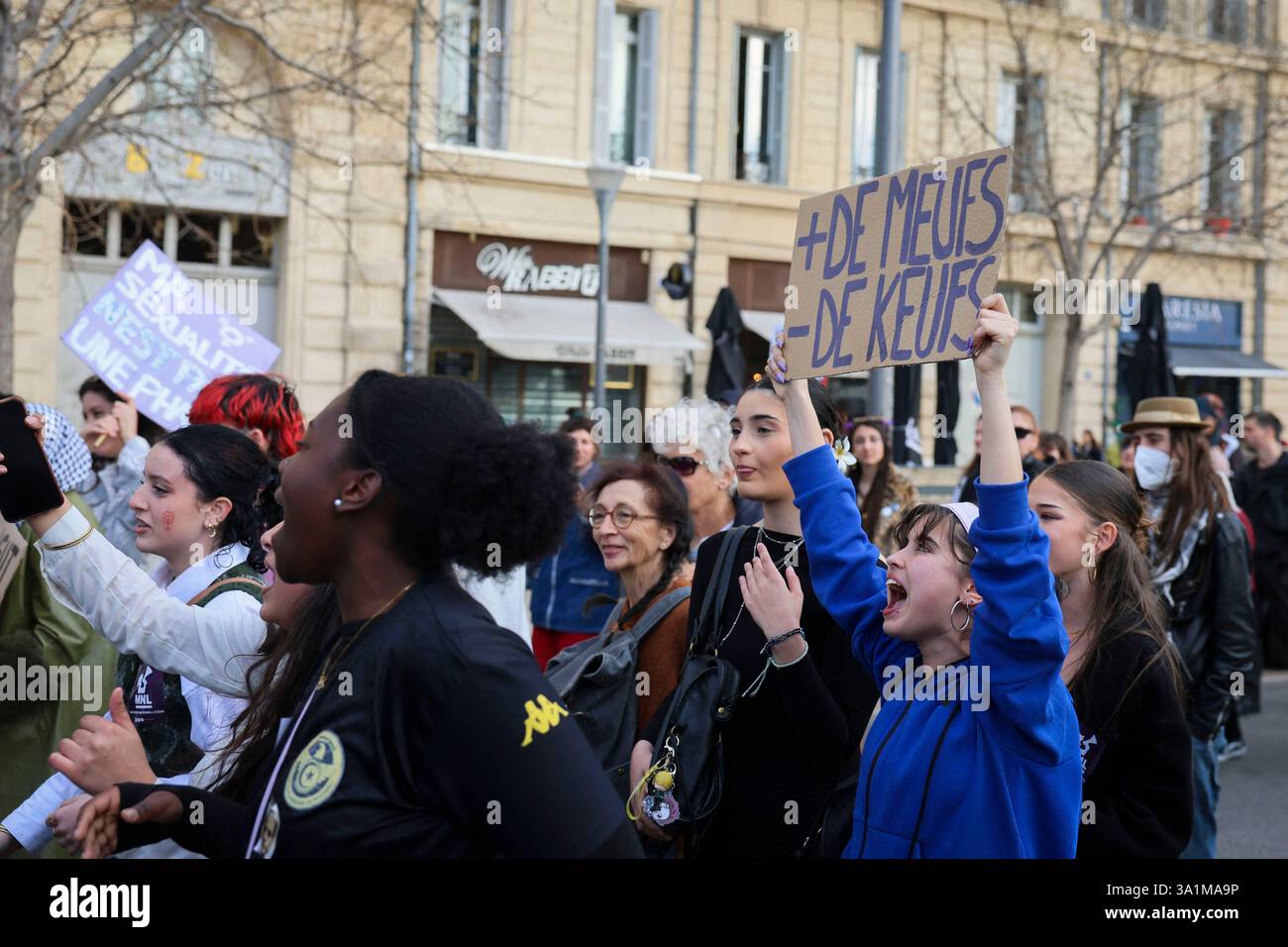 The signs held by the protesters display messages of support for the ...