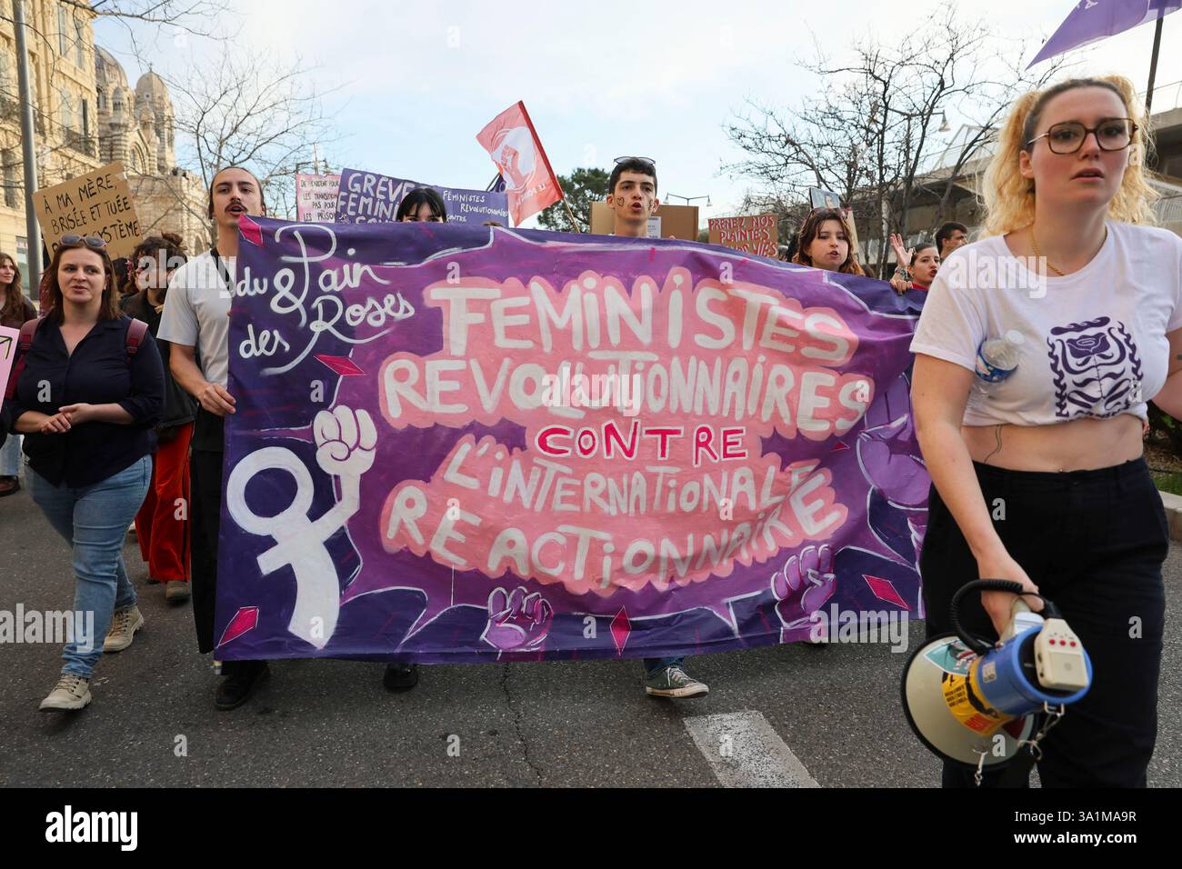 The signs held by the protesters display messages of support for the ...