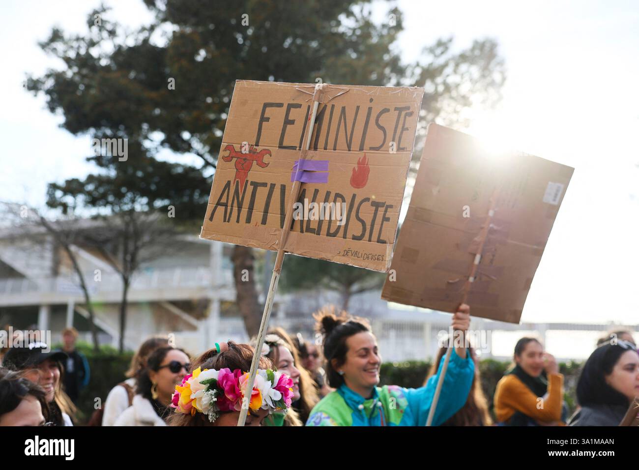 The signs held by the protesters display messages of support for the ...