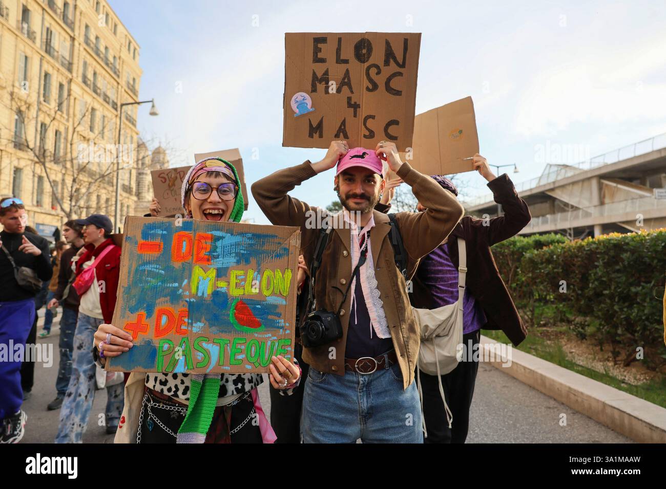 The signs held by the protesters display messages of support for the ...
