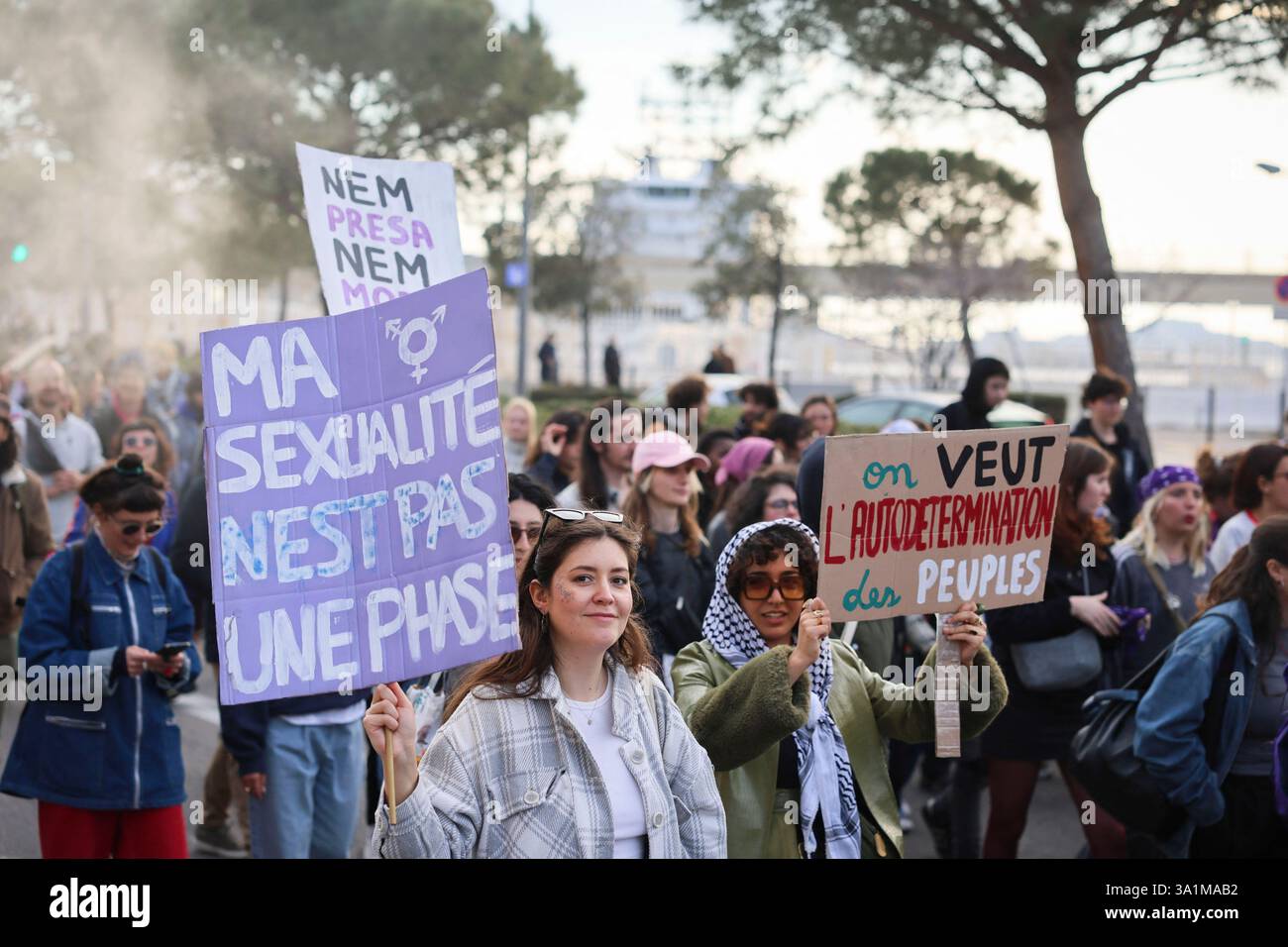 The signs held by the protesters display messages of support for the ...