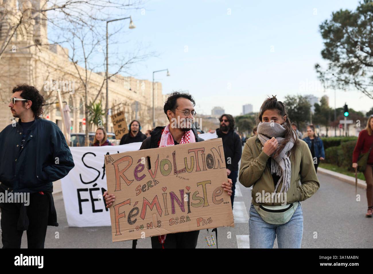 The signs held by the protesters display messages of support for the ...