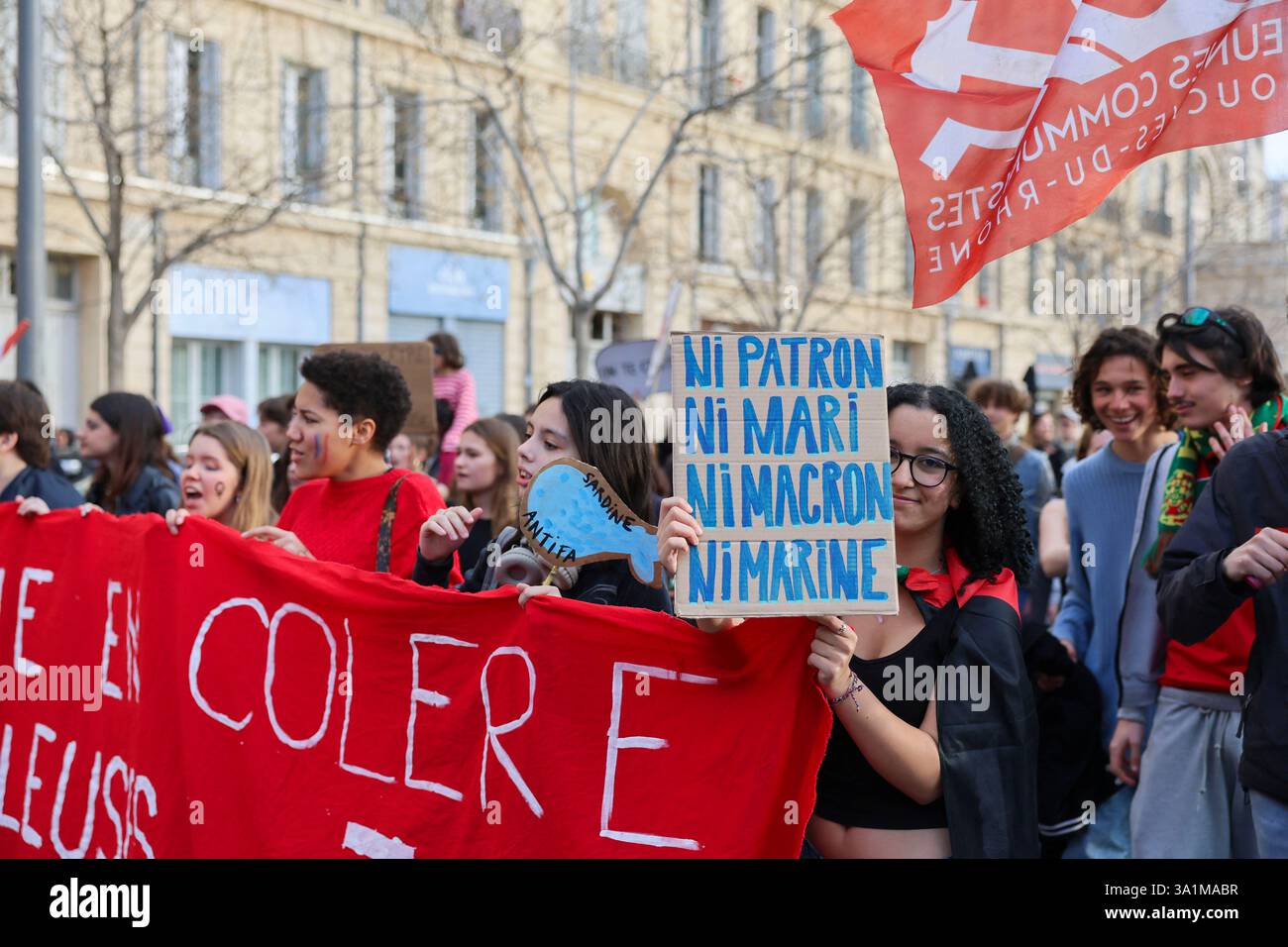 The signs held by the protesters display messages of support for the ...