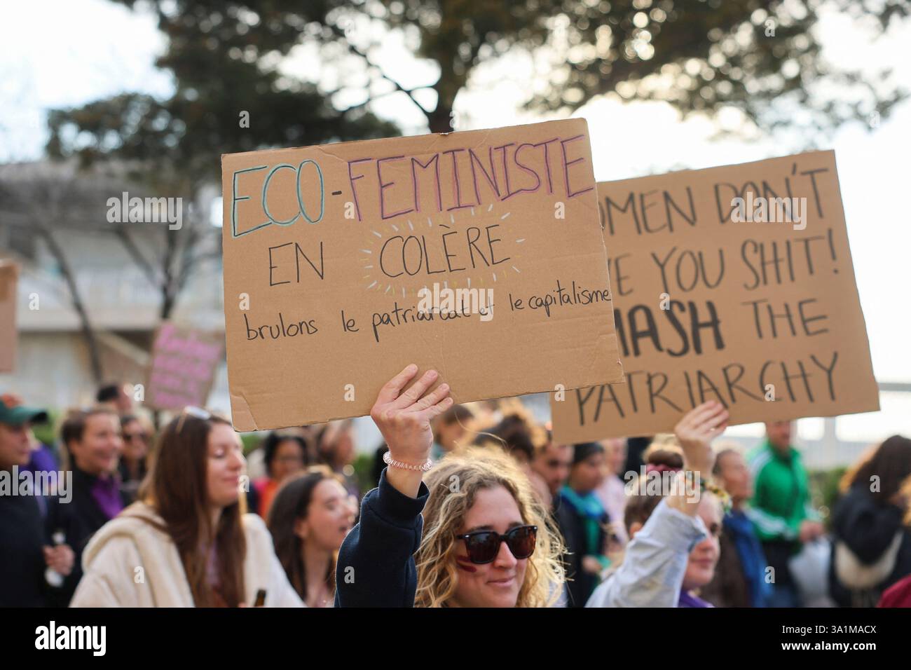 The signs held by the protesters display messages of support for the ...