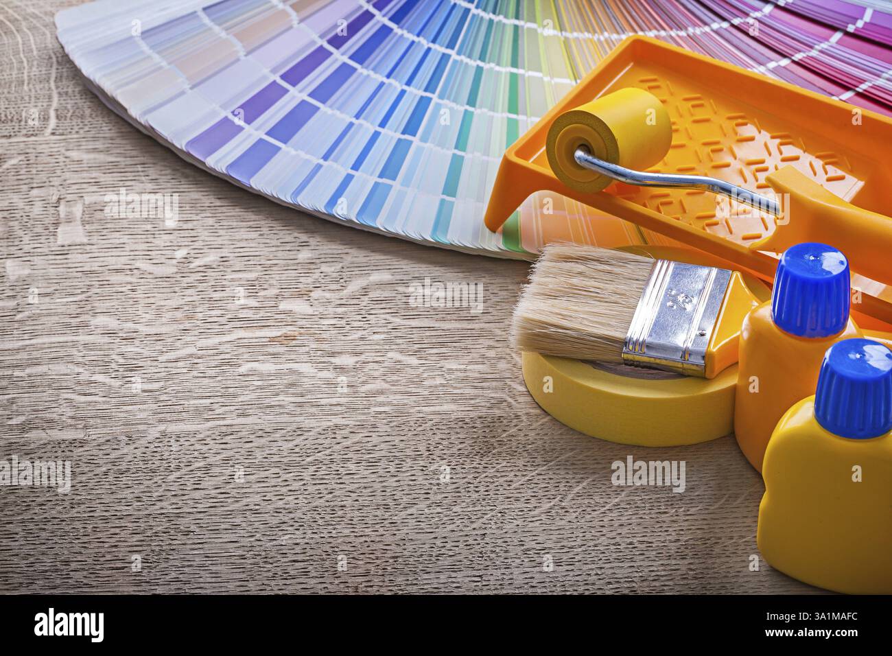 Paint tools on board Stock Photo - Alamy