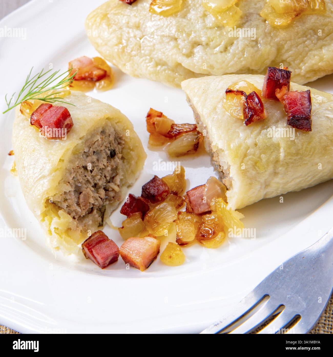 Rustic Cepelinai, a specialty Lithuanian and Polish cuisine Stock Photo ...