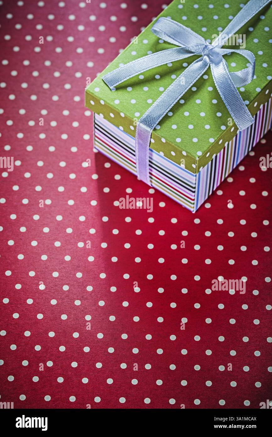 Present box on red textile top view celebrations concept Stock Photo ...