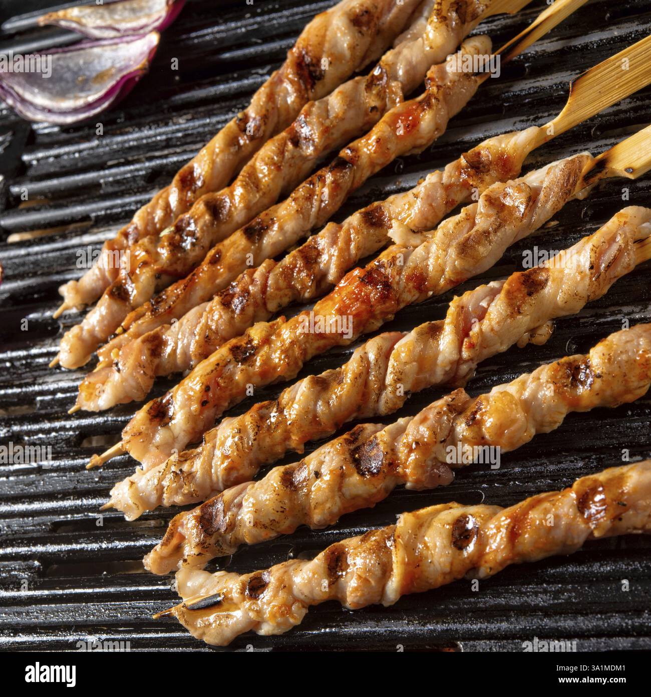 Fresh and crispy rustic pork belly grill sticks Stock Photo - Alamy