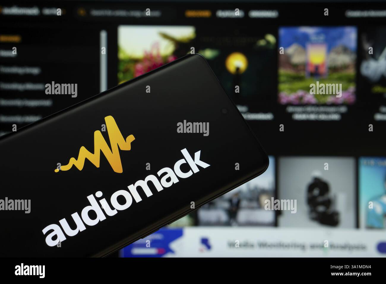 Audiomack logo is seen on a smartphone Stock Photo - Alamy