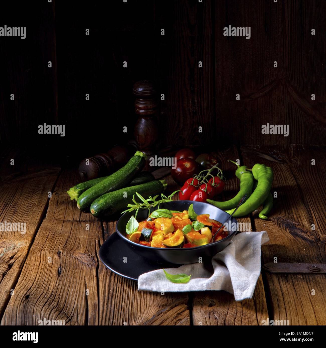 Vegetarian ratatouille with fresh vegetables and herbs Stock Photo - Alamy