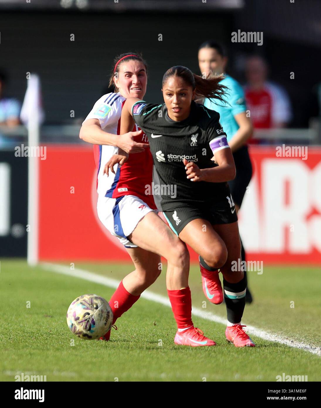 Liverpool's Taylor Hinds (right) and Arsenal's Caitlin Foord (left ...