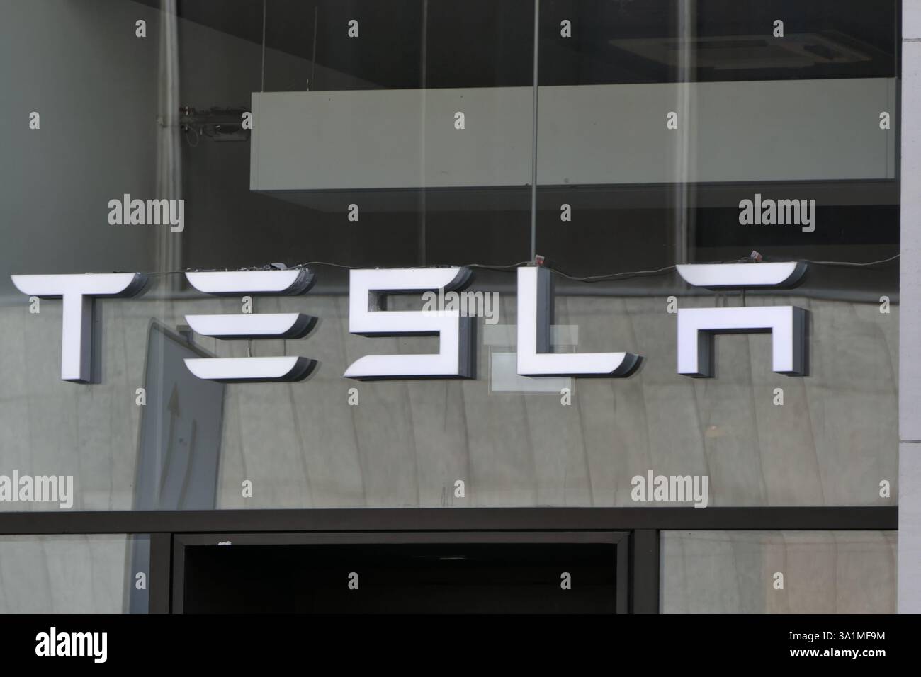 Logo of Tesla at A Store in Berlin, Germany Stock Photo - Alamy