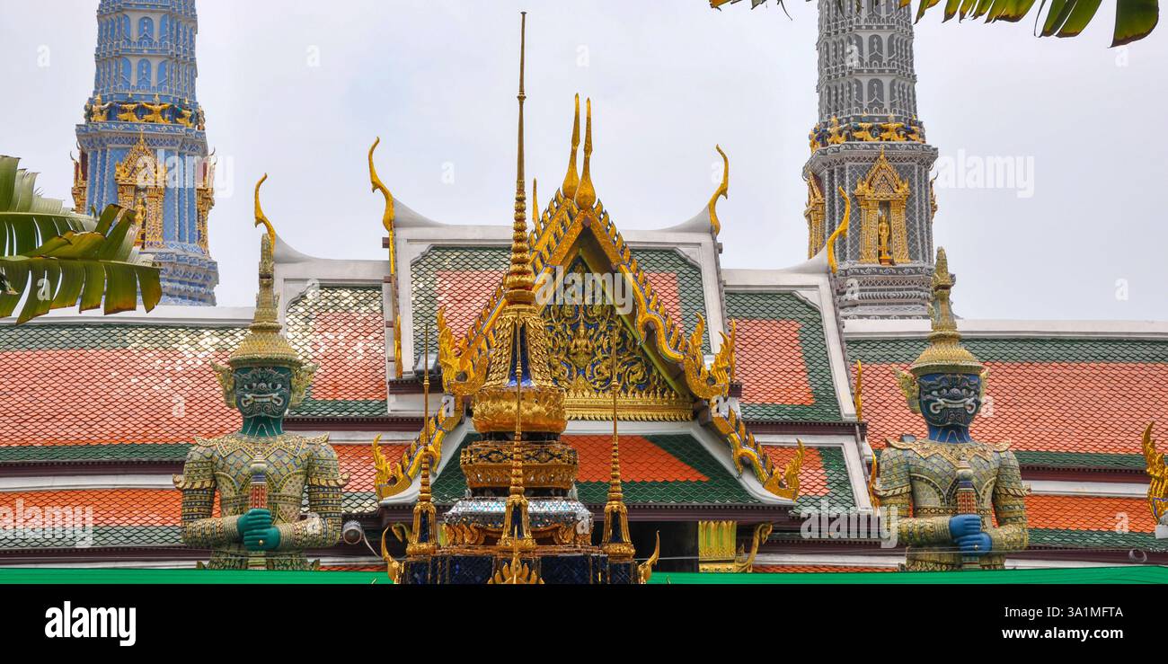 Bangkok, Thailand - May 4, 2009: The intricate golden spires and ...