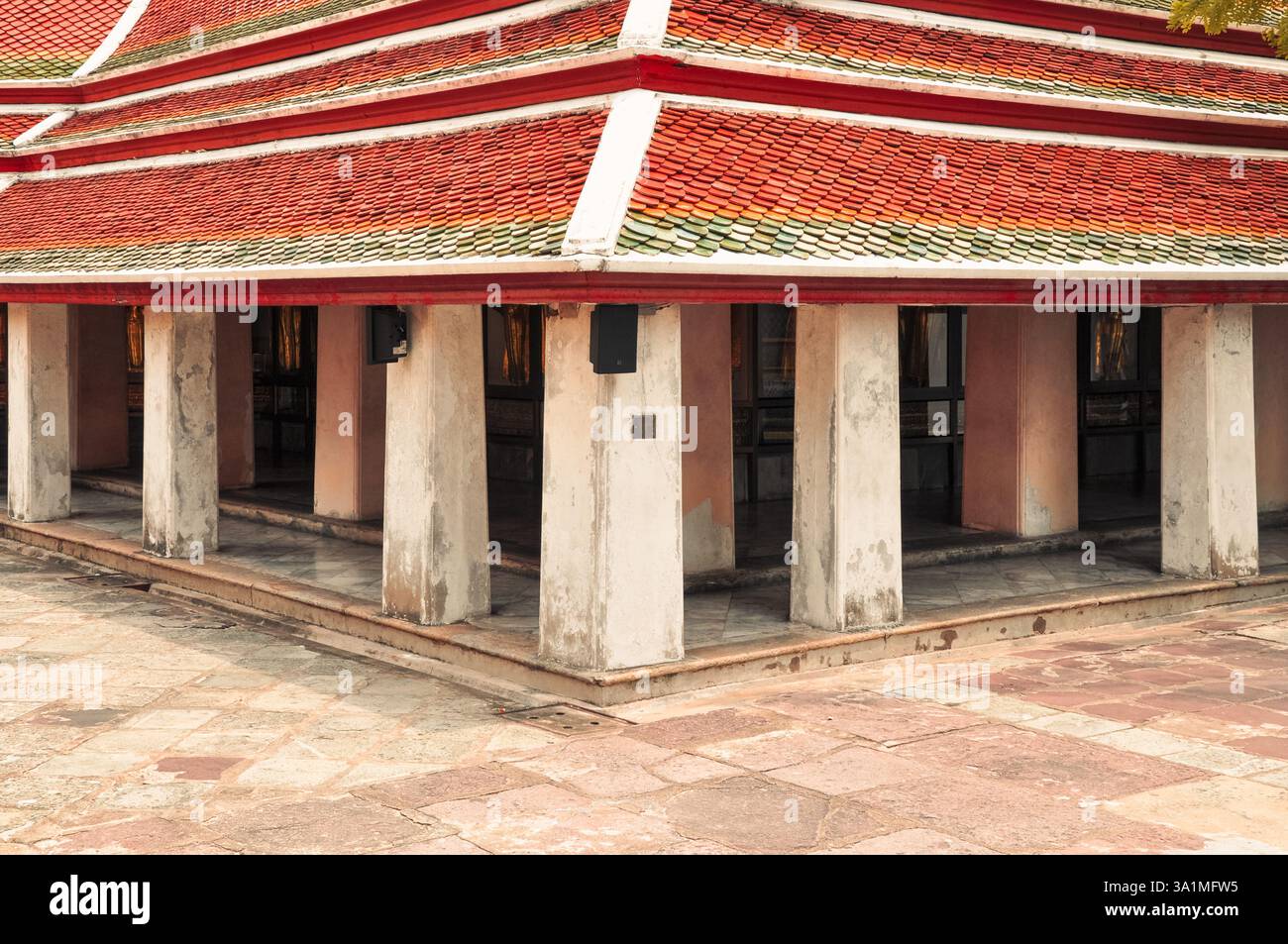 Bangkok, Thailand - May 4, 2009: Vibrant red roof tiles and weathered ...