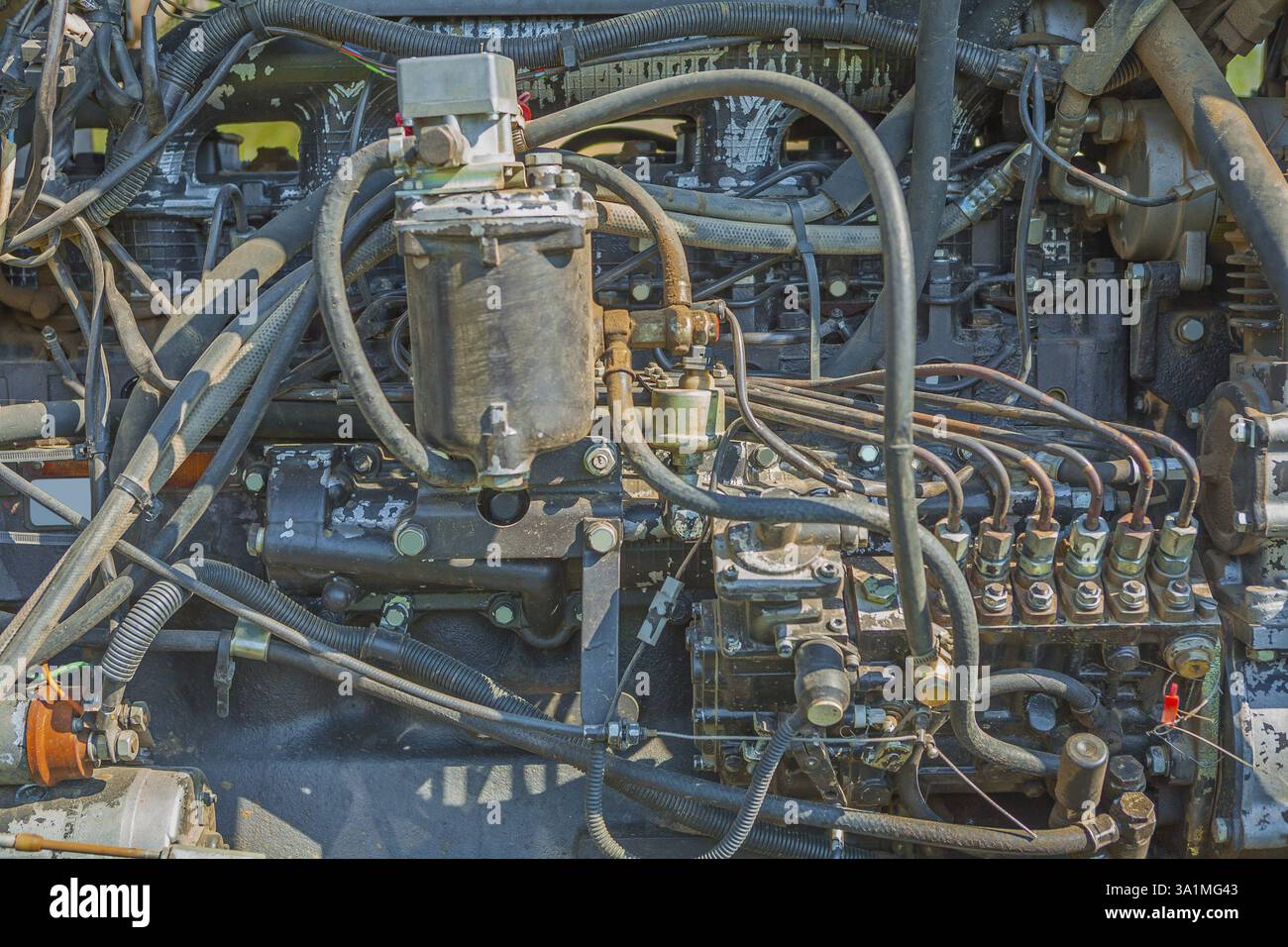 Old messy diesel motor close up view Stock Photo - Alamy