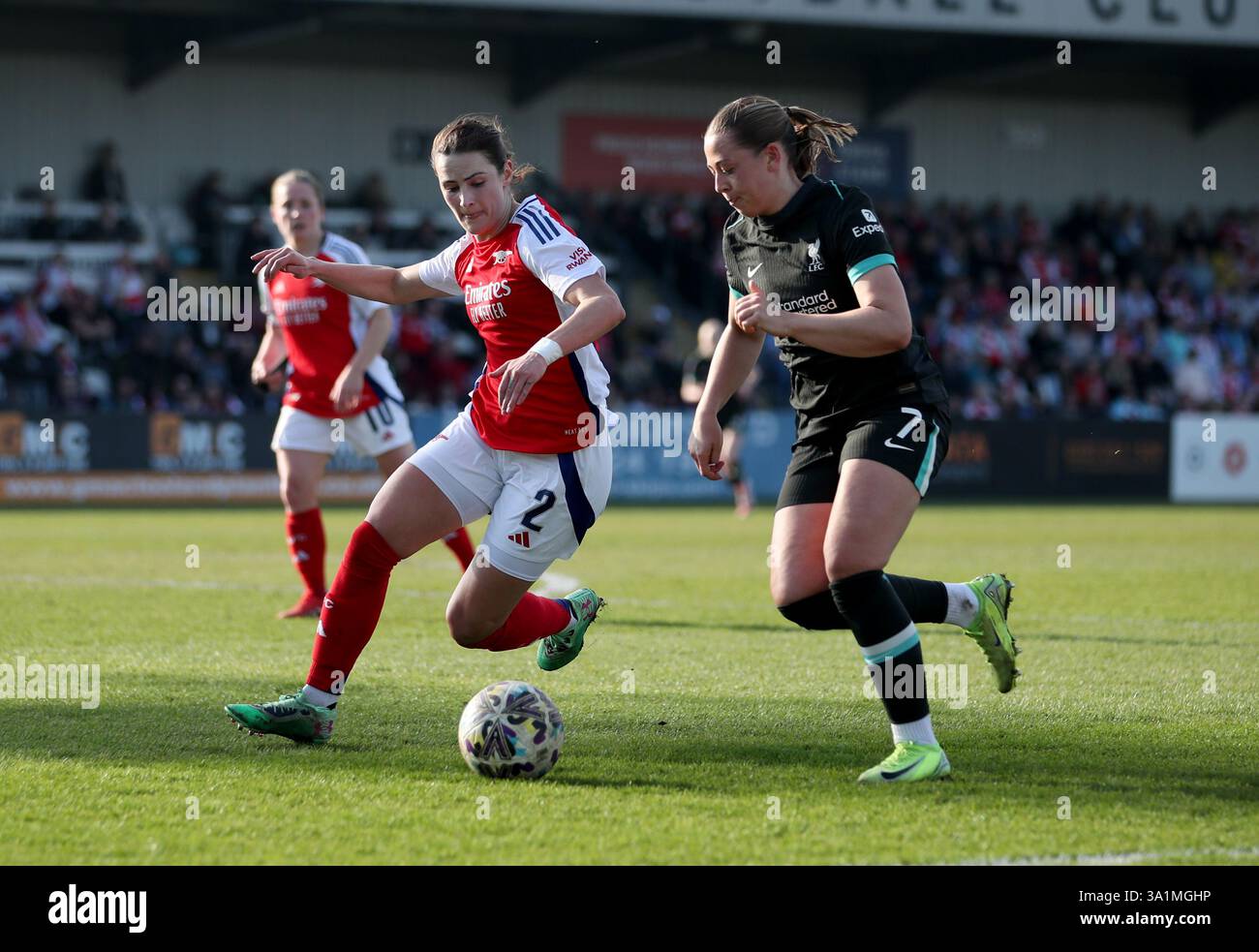 Arsenal's Emily Fox (left) and Liverpool's Cornelia Kapocs (right ...