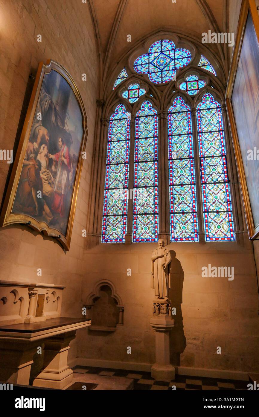 Paris France, March 6, 2025. Notre Dame. Stained glass window of the ...