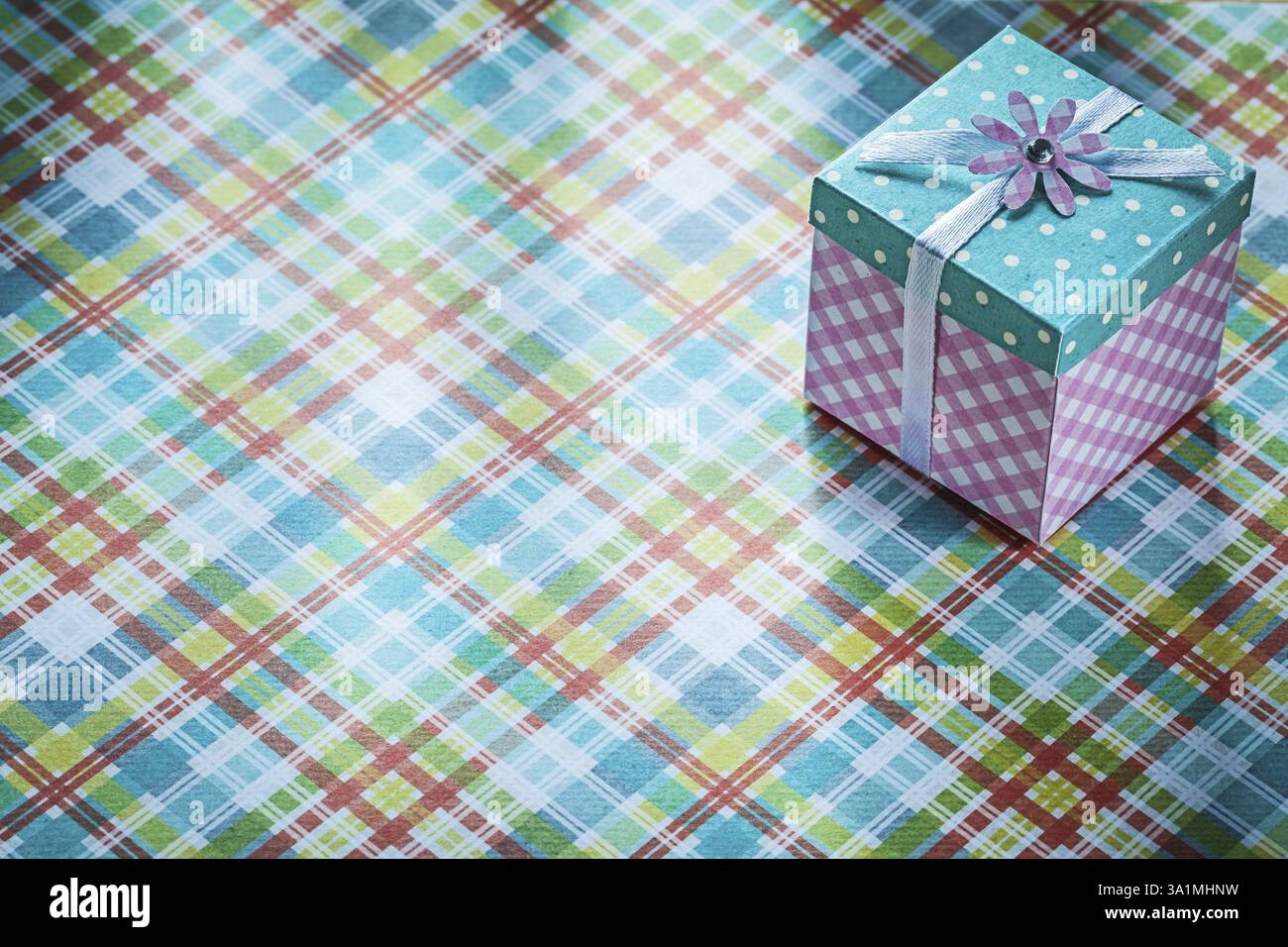 Packed present box on checked textile celebrations concept Stock Photo ...