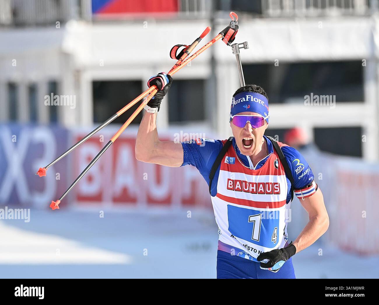 Quentin Fillon Maillet from France reacts in finish line of men's relay ...