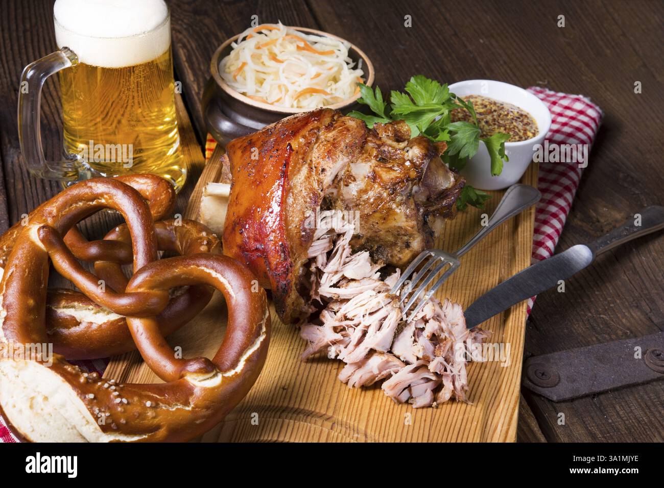 Crispy fried Bavarian pork knuckle with soft meat Stock Photo - Alamy