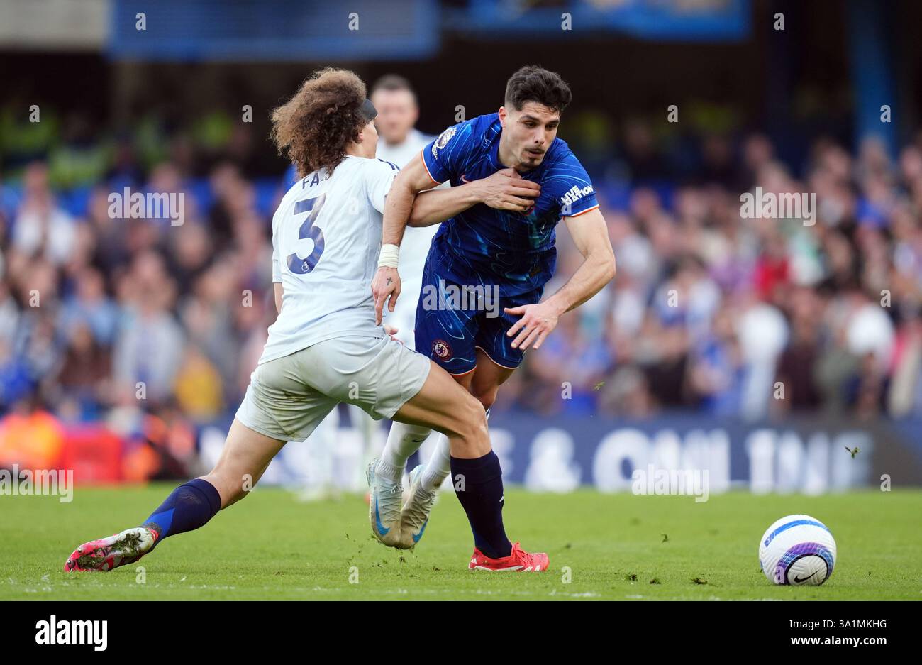 Leicester City's Wout Faes and Chelsea's Pedro Neto (right) battle for ...