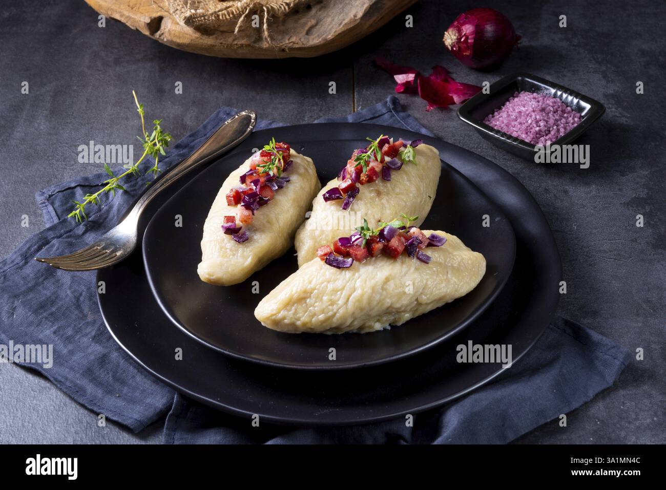 Rustic Cepelinai, a specialty Lithuanian and Polish cuisine Stock Photo ...