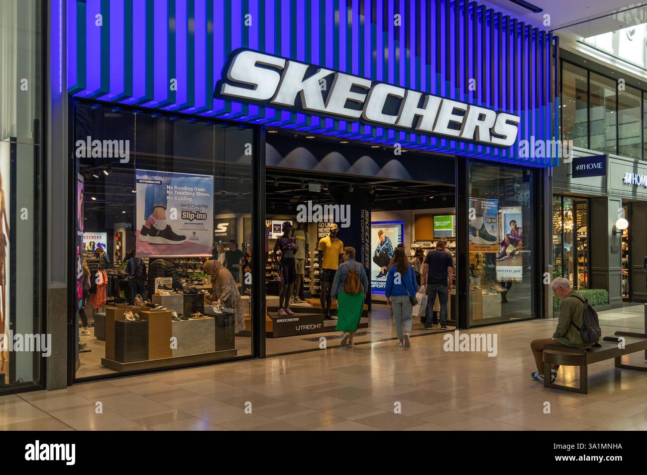 Skechers sign logo above the entrance shop, Skechers is an American ...