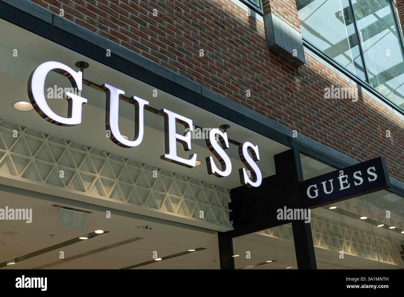 Guess logo sign above the shop entrance in Utrecht, Guess is an ...