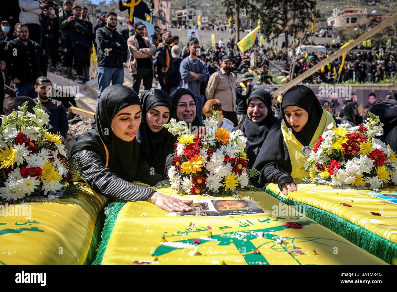 09 March 2025, Lebanon, Kfarkela: Shia Muslim women mourn over the ...