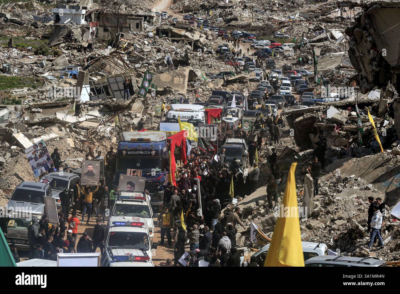 Kfarkela, Lebanon. 09th Mar, 2025. Trucks loaded with coffins of pro ...