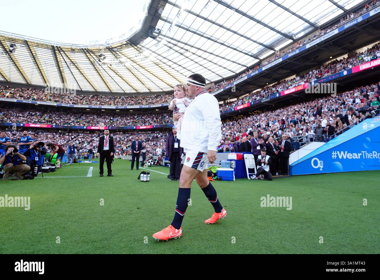 England's Jamie George walks out with his daughter, Lydia, ahead of the ...