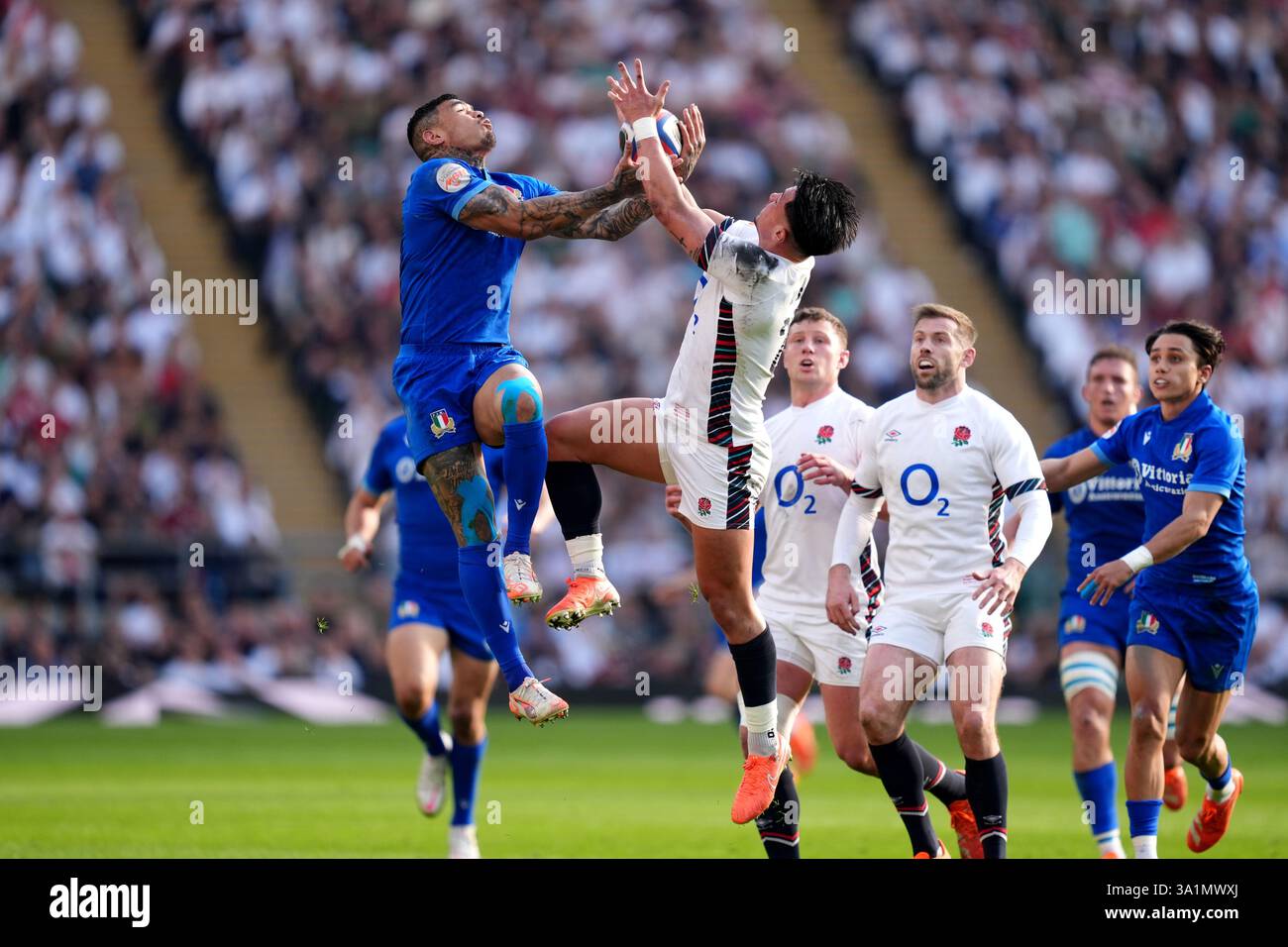 London, England. 9th March, 2025. Italy's Monty Ioane and England's ...