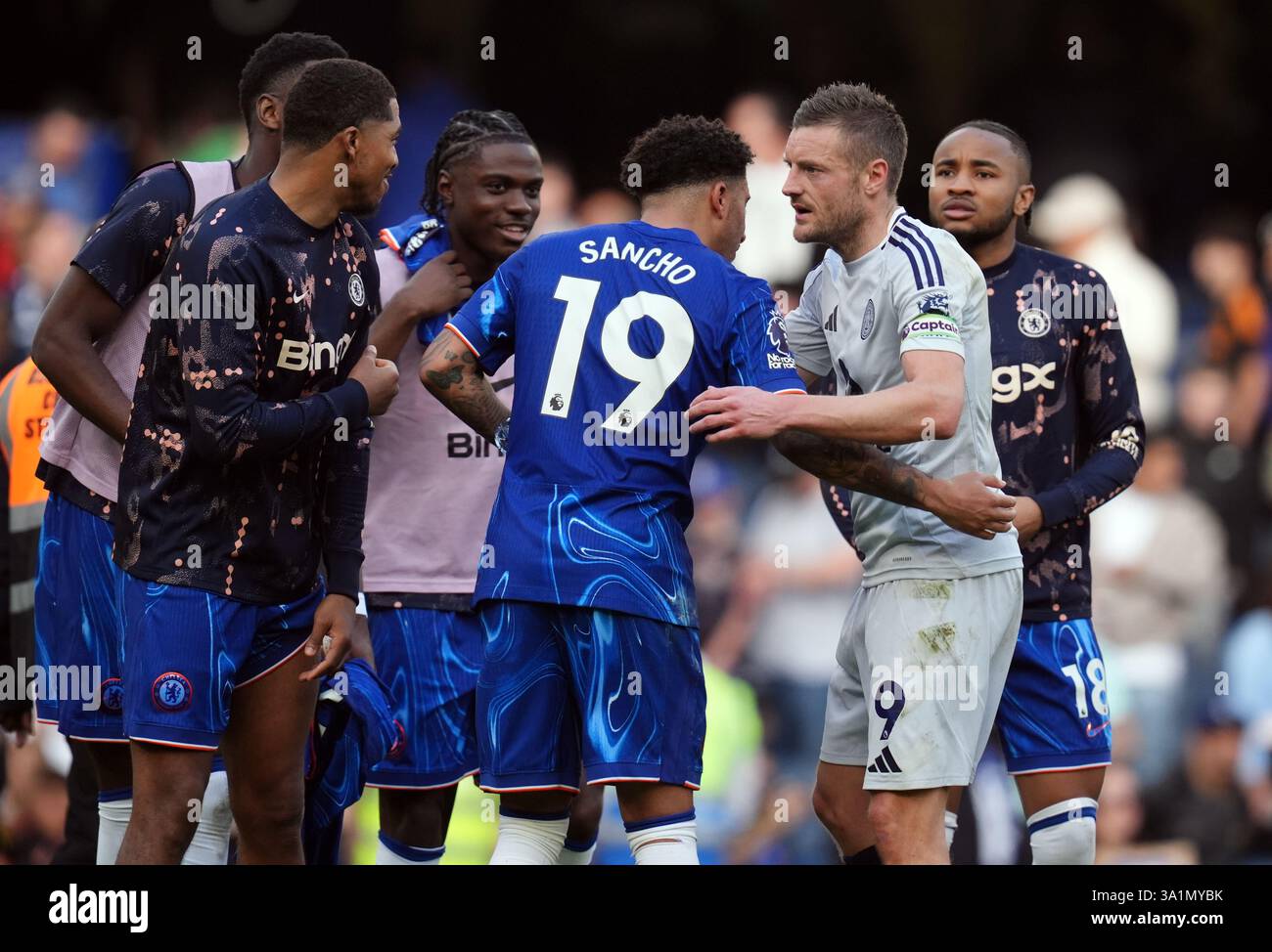Leicester City's Jamie Vardy with Chelsea's Jadon Sancho following the ...