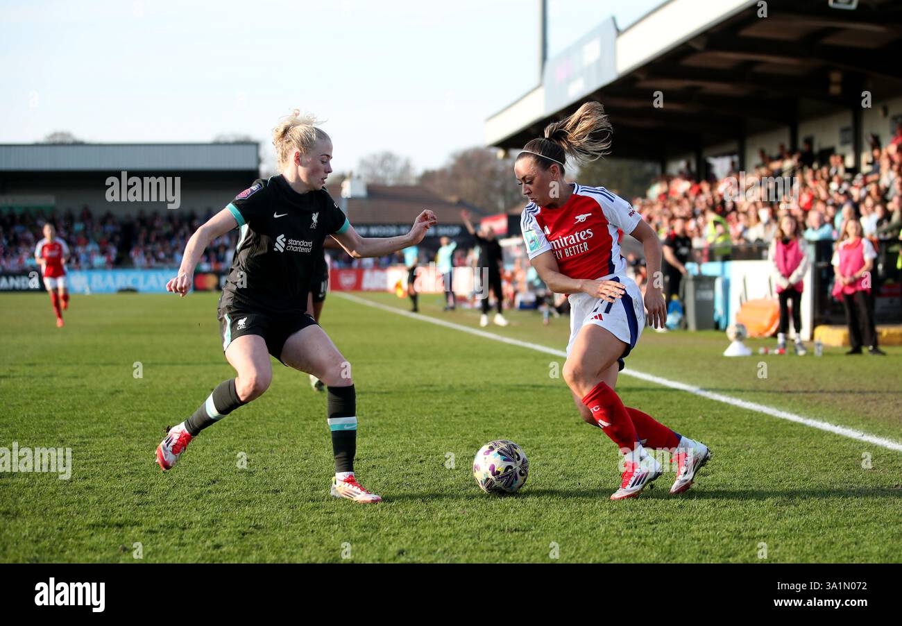 Liverpool's Grace Fisk (left) and Arsenal's Katie McCabe (right) battle ...
