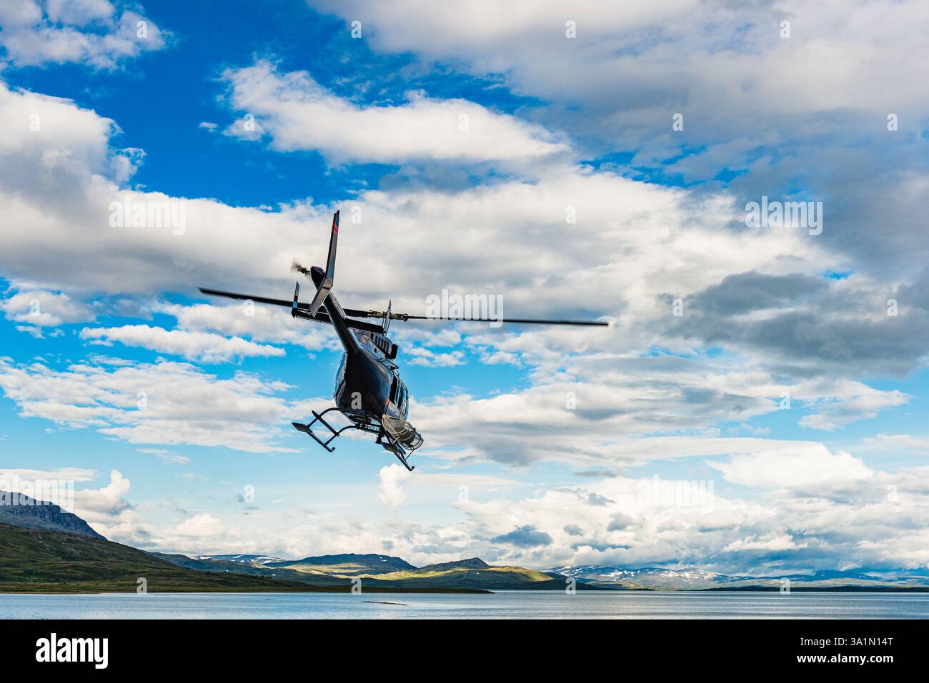 A helicopter is navigating the stunning Swedish sky, capturing the ...
