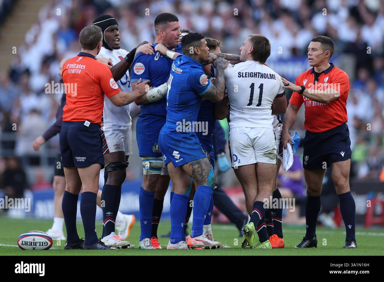England's Ollie Sleightholme, right, involved in a disagreement with ...