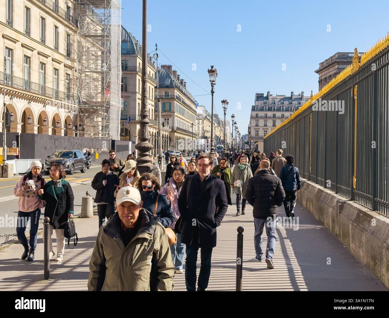 Paris, people walking on Rue de Rivoli, urban cityscape and historic ...