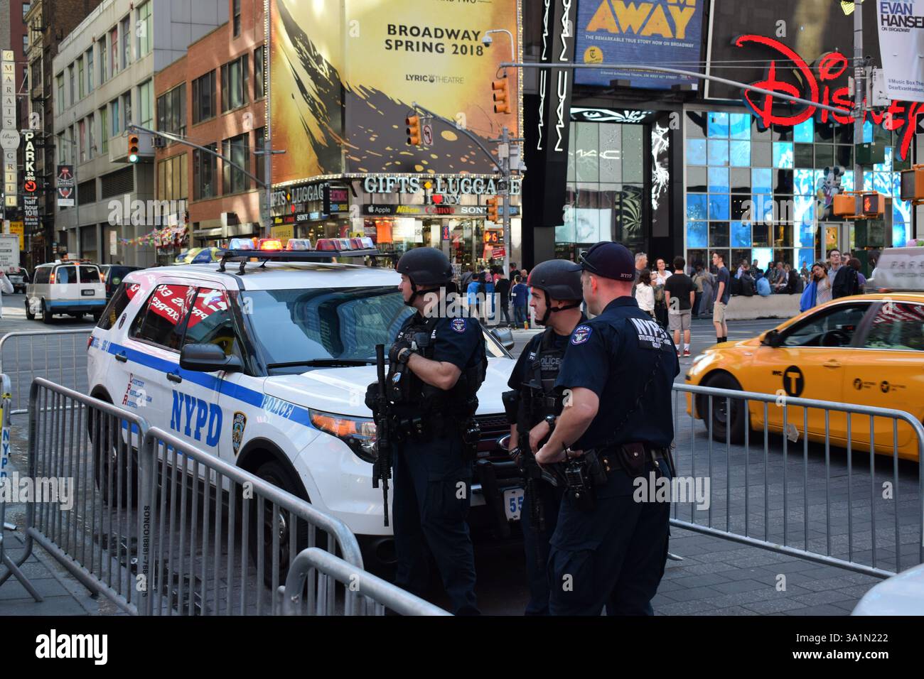 A New York City police car stationed in the bustling Times Square ...