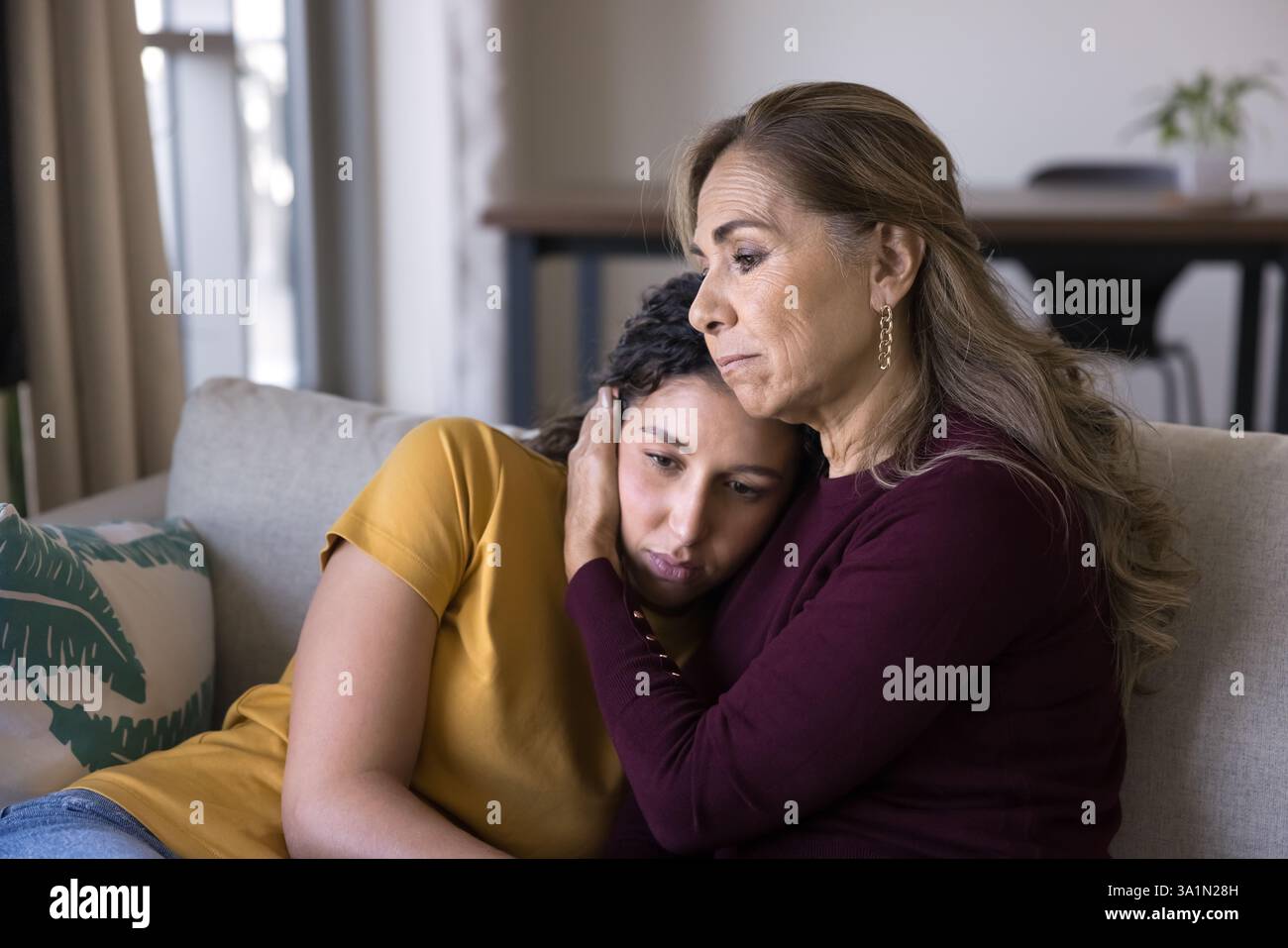 Loving mother hugging, comforting her adult daughter Stock Photo - Alamy